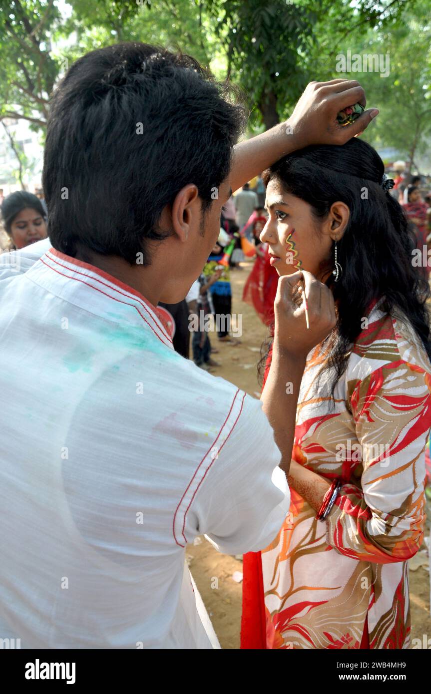 Face painting during the New year celebrations. Shahbag, Dhaka. Bangladesh Stock Photo - Alamy