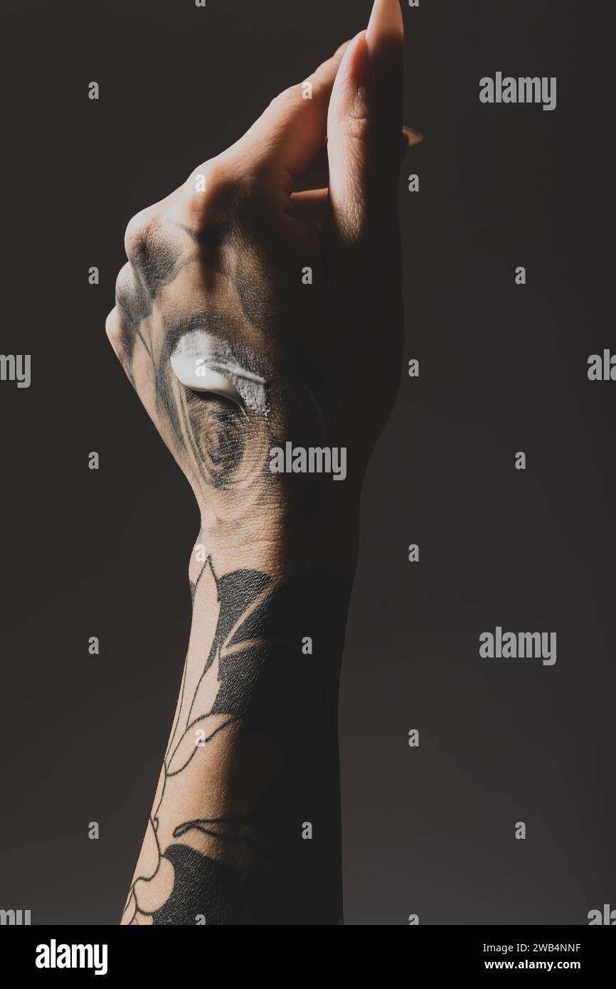 Applying tattoos hi-res stock photography and images - Alamy