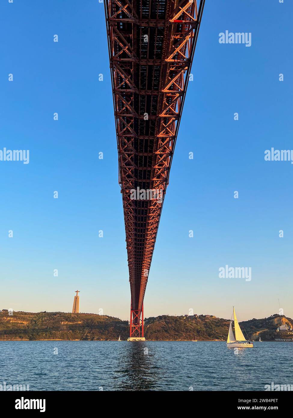 Passing under the 25th April Bridge in Tagus River, Lisbon Stock Photo ...