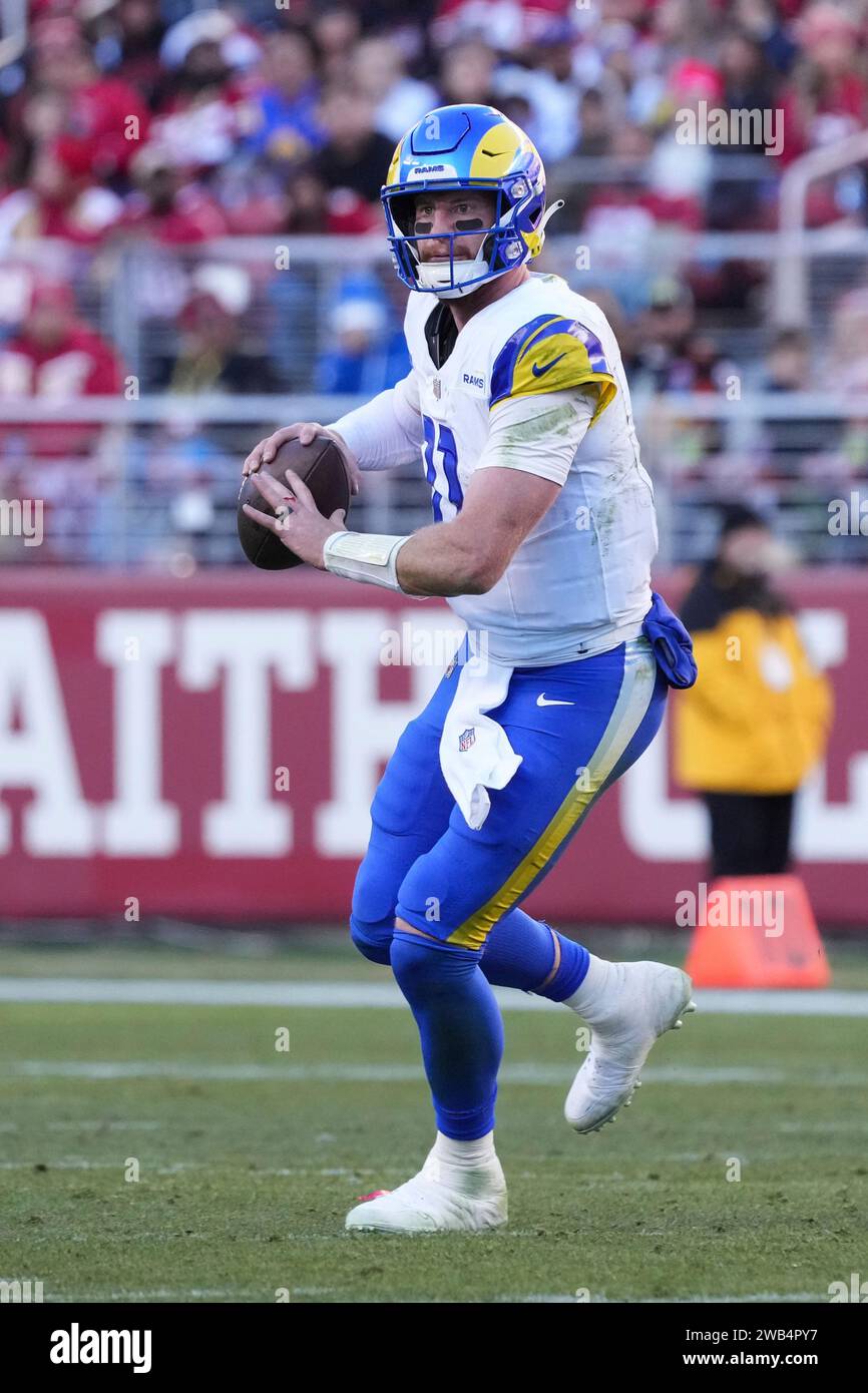 Los Angeles Rams quarterback Carson Wentz (11) looks to pass during an ...