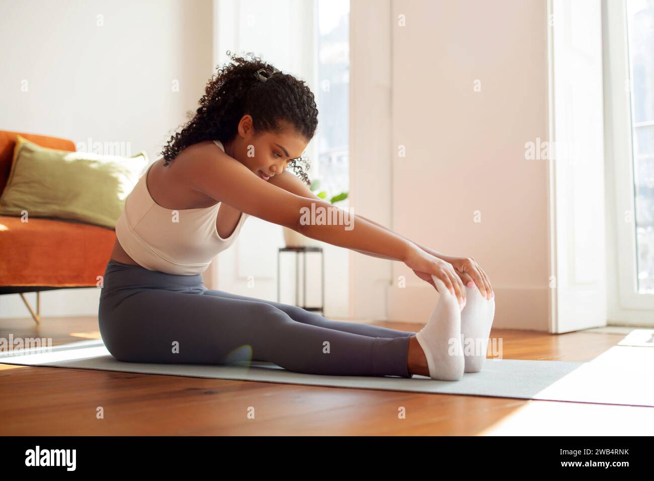 Seated toe touch hi-res stock photography and images - Alamy