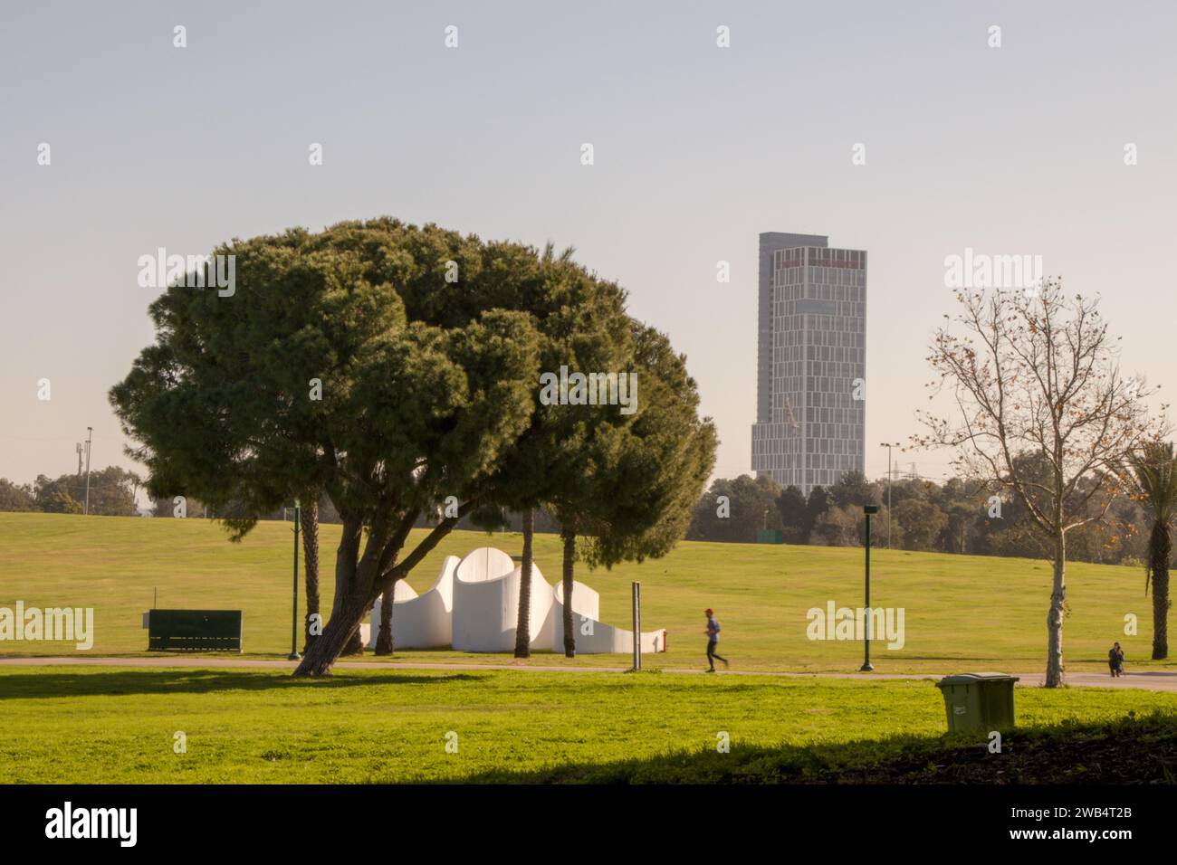A large park in the city center with wide green lawns, bike ,walking ...
