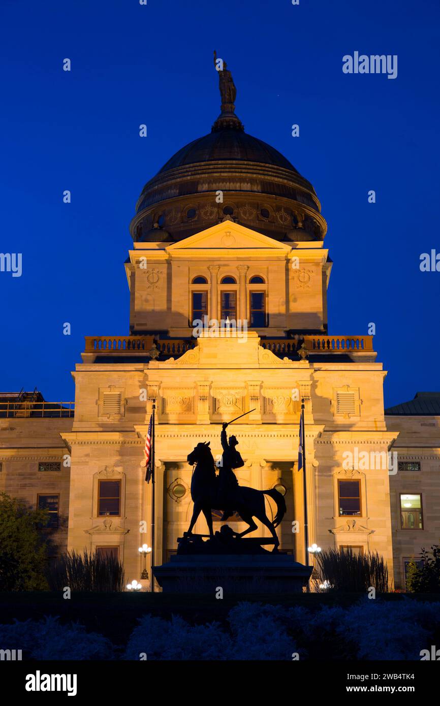 Thomas Francis Meagher statue with capitol at night, Montana State ...