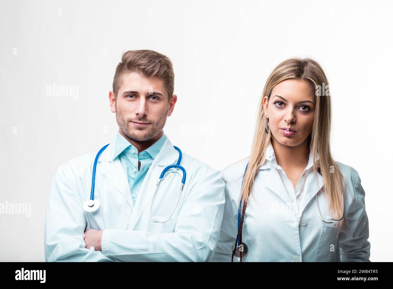 Medical team portrayed in harmony, with crossed arms and focused expressions, showcasing ...