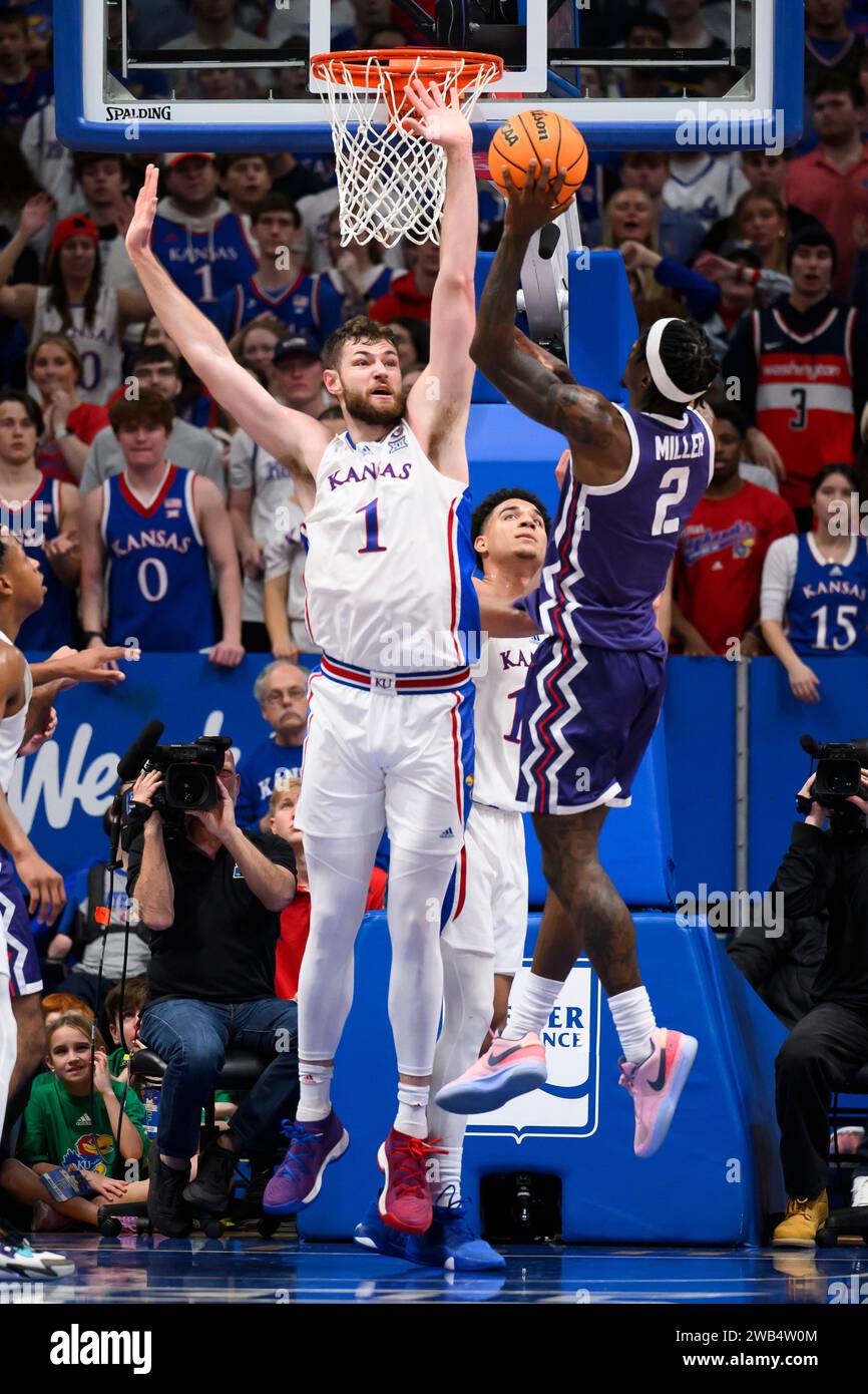 Kansas center Hunter Dickinson (1) tries to block a shot by TCU forward ...