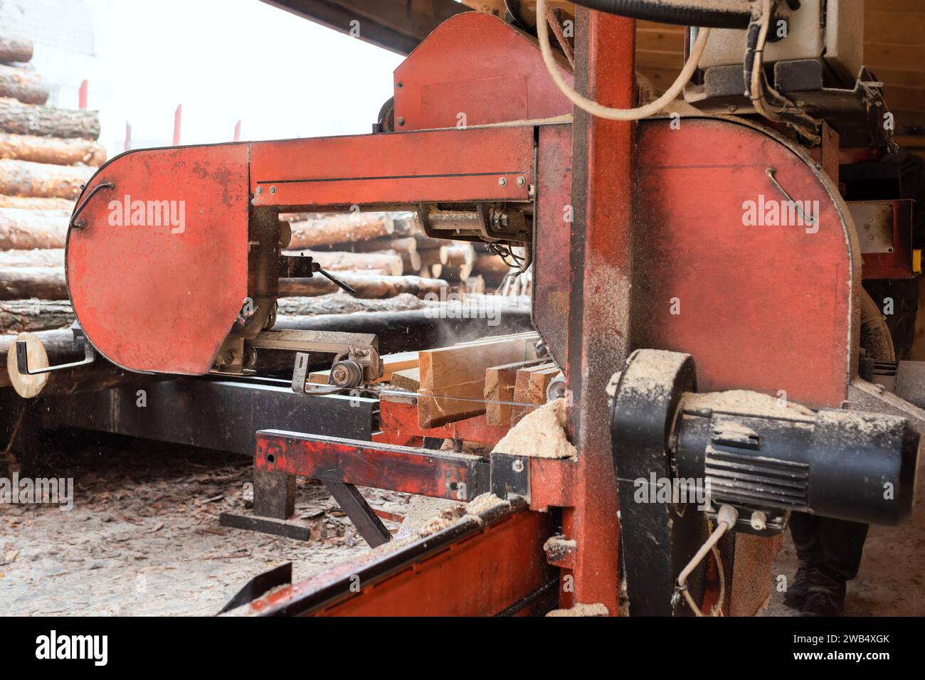 Processing wooden boards at a sawmill. In the process of processing ...
