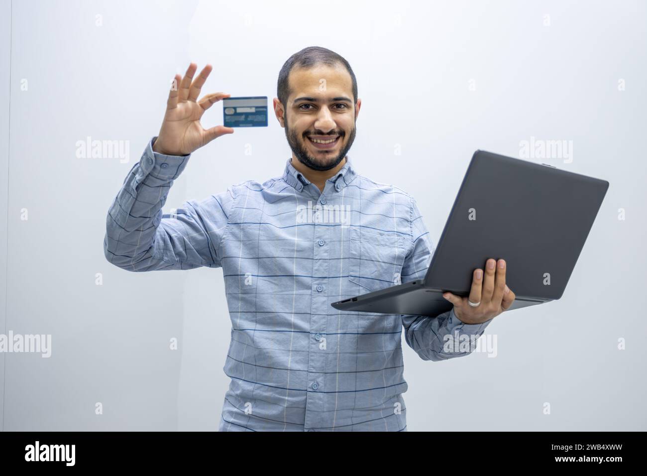 Holding debit hi-res stock photography and images - Alamy