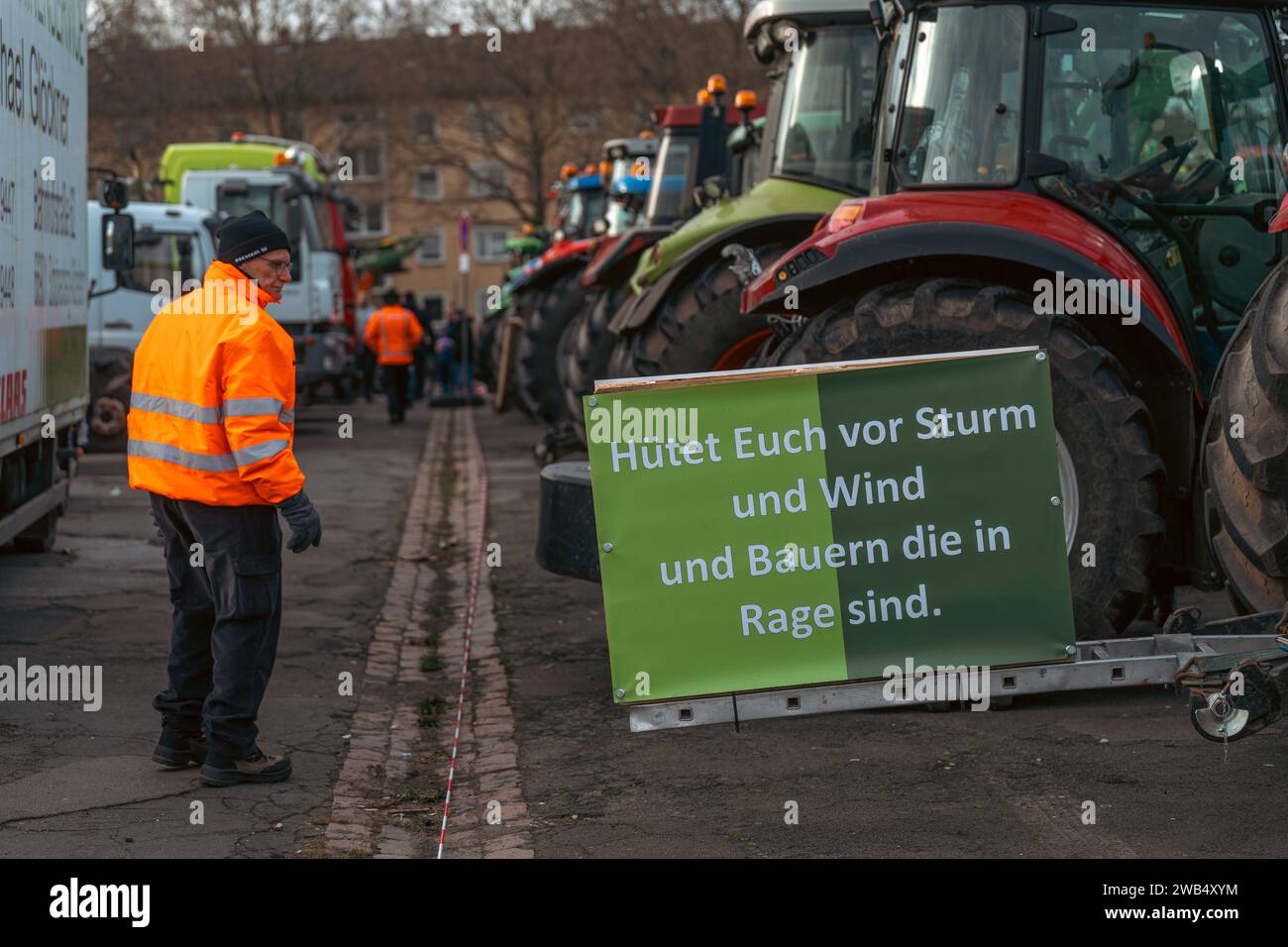 Kaiserslautern, Germany. 8th January, 2024. Farmer standing next to a ...