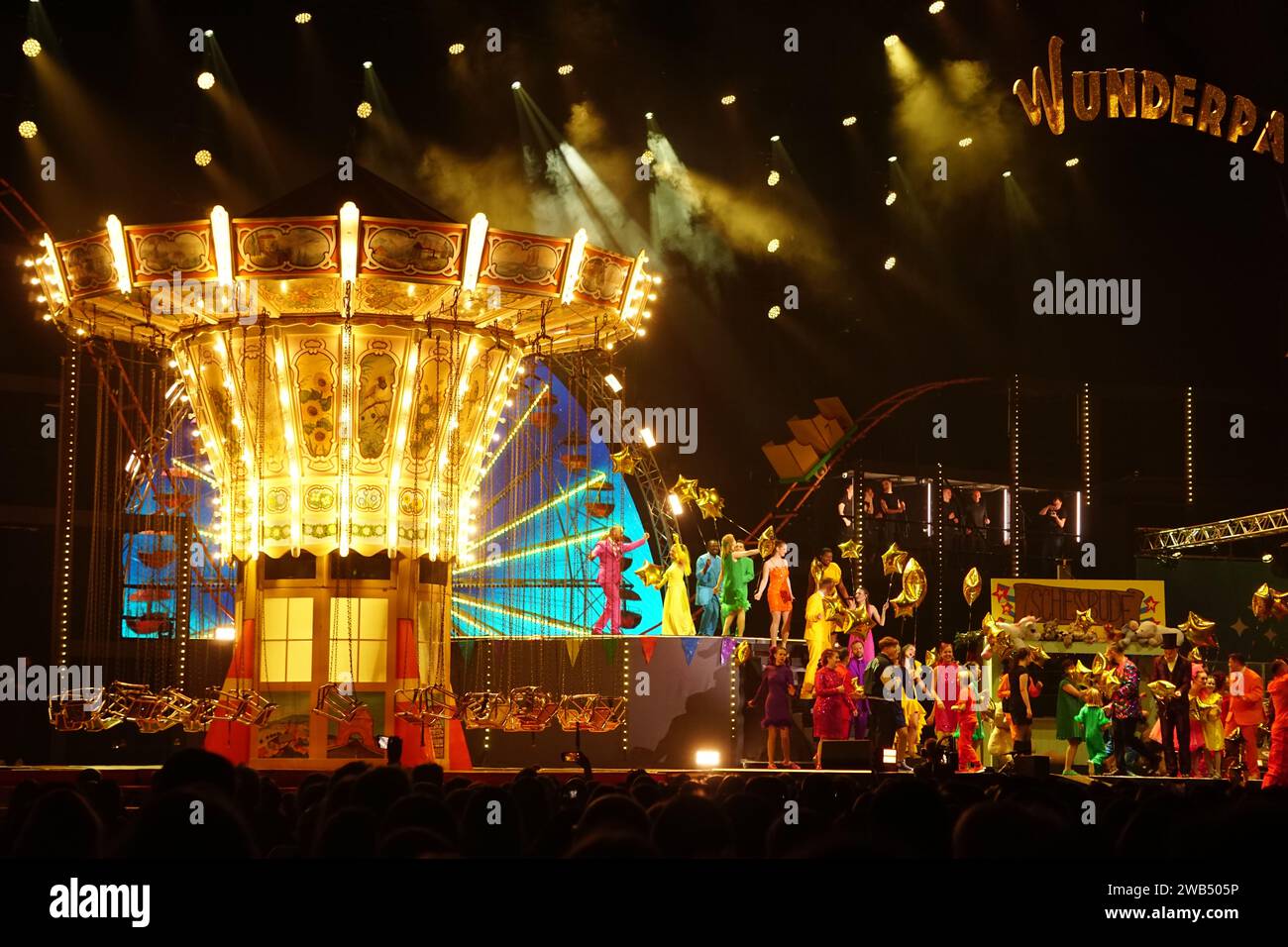 A vibrant and lively event taking place in a large venue, featuring a ...