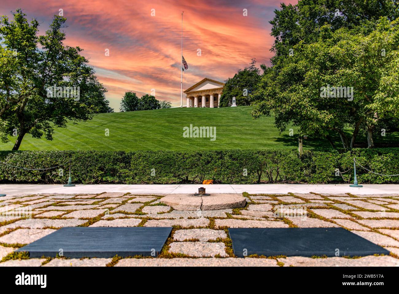 Two sunset or sunrise graves of John F. Kennedy and his wife with the ...