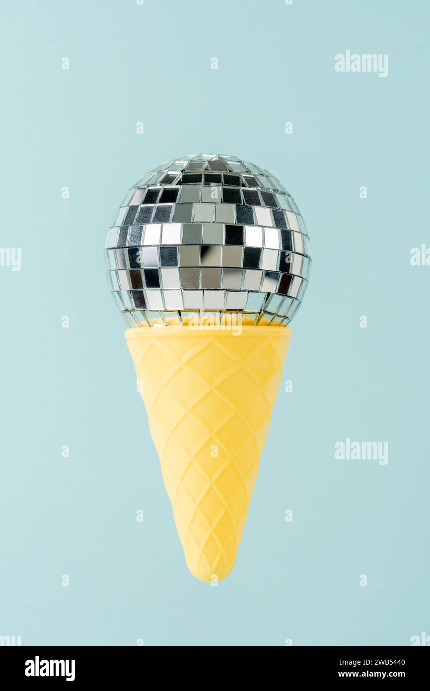 Disco ball ice cream on bright blue background. Minimal party concept ...