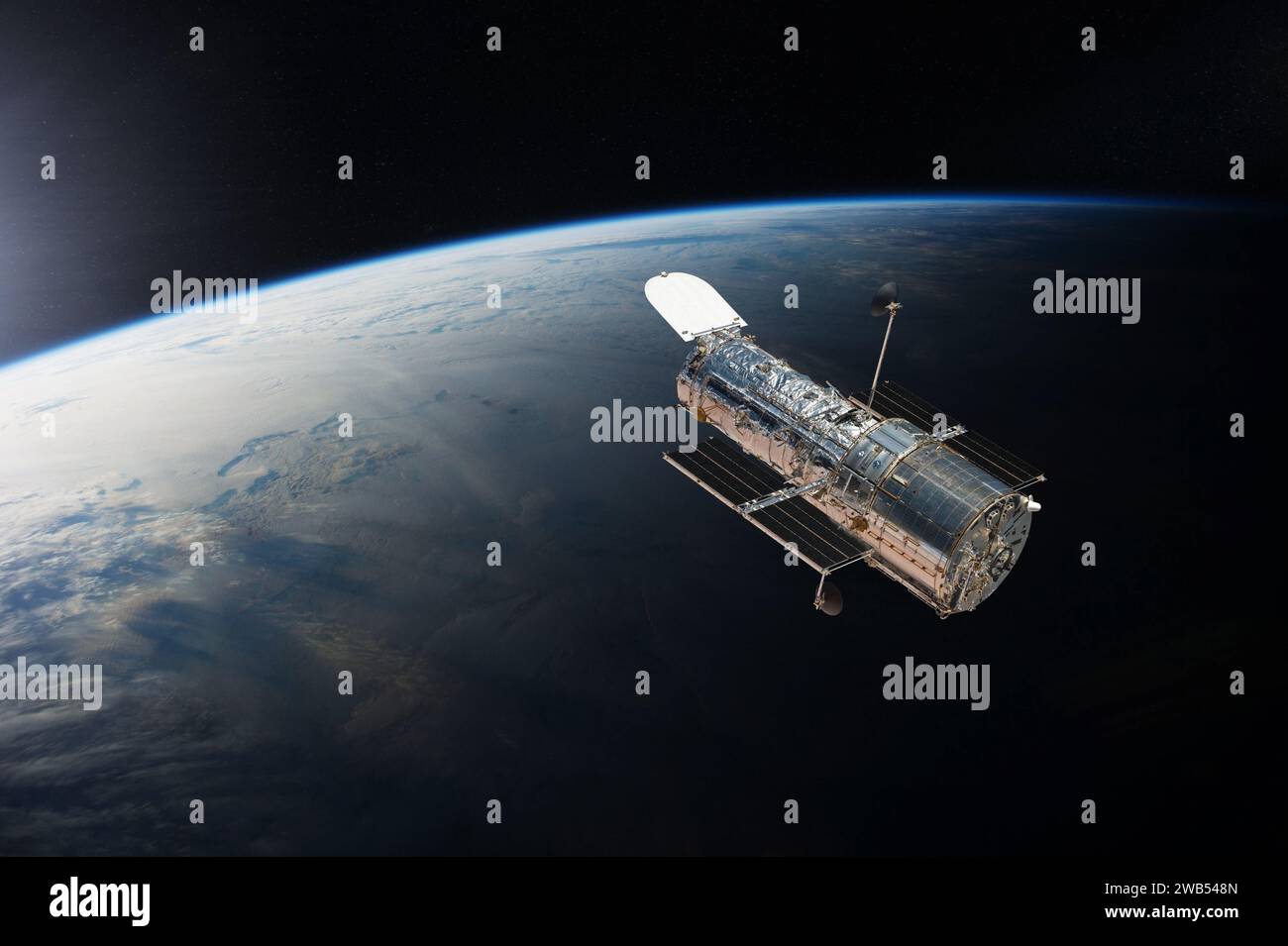 The Hubble space telescope in outer space. Elements of this image ...