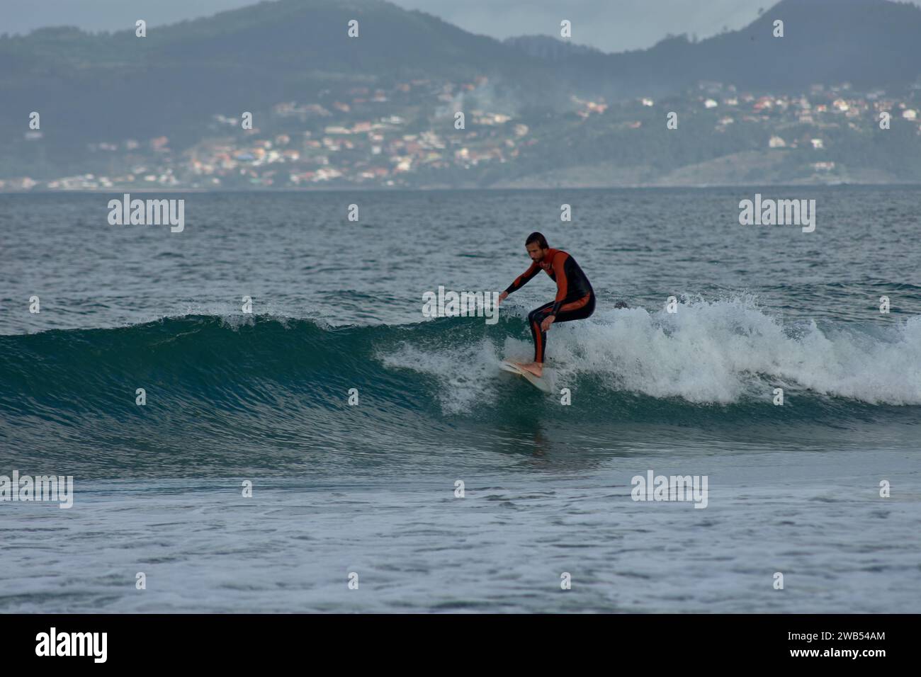 Patos beach in Nigrán Pontevedra is filled with surfers when strong ...