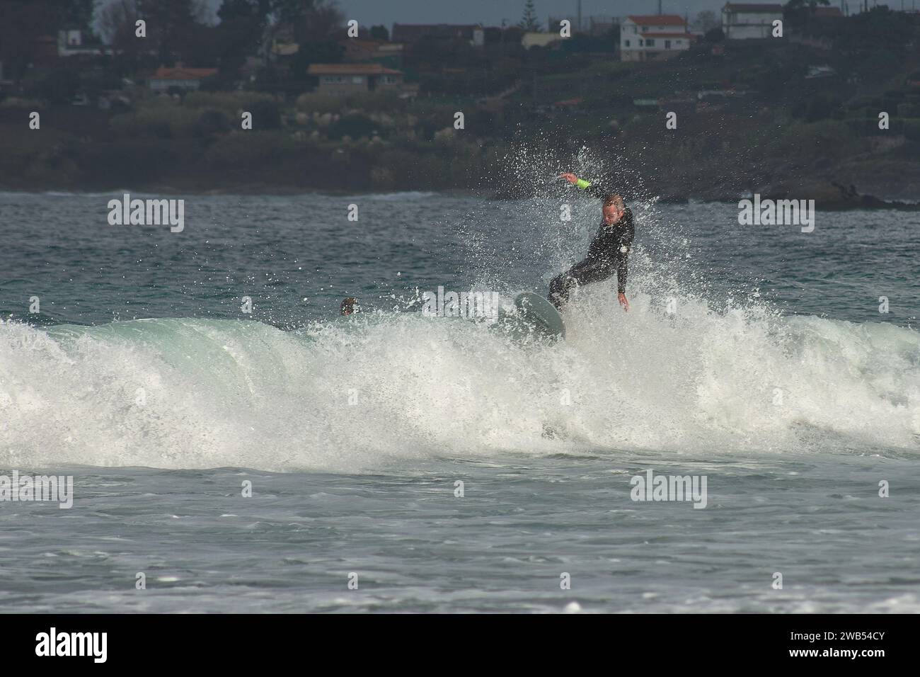 Patos beach in Nigrán Pontevedra is filled with surfers when strong ...