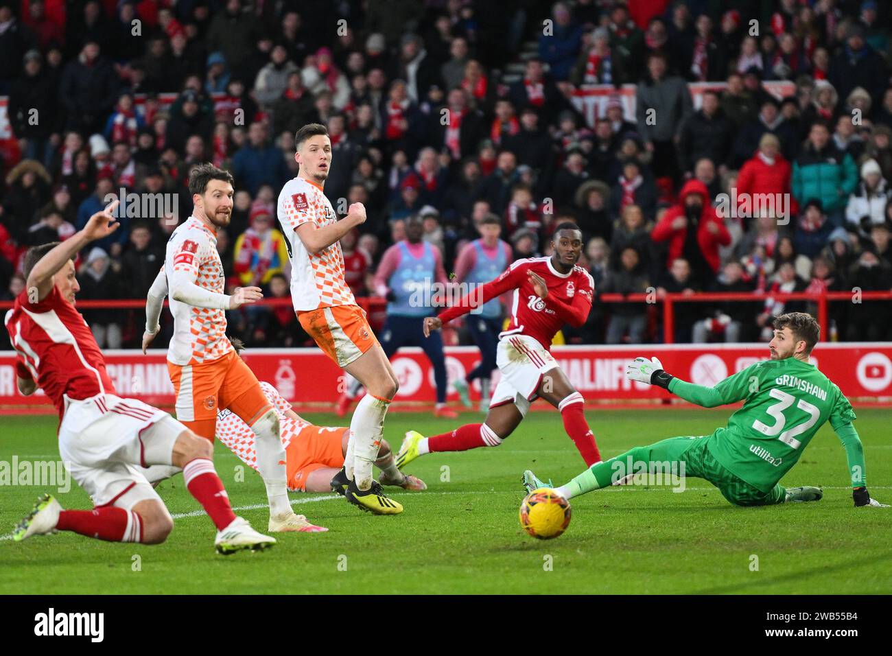 Daniel Grimshaw of Blackpool watches at Callum Hudson-Odoi of ...