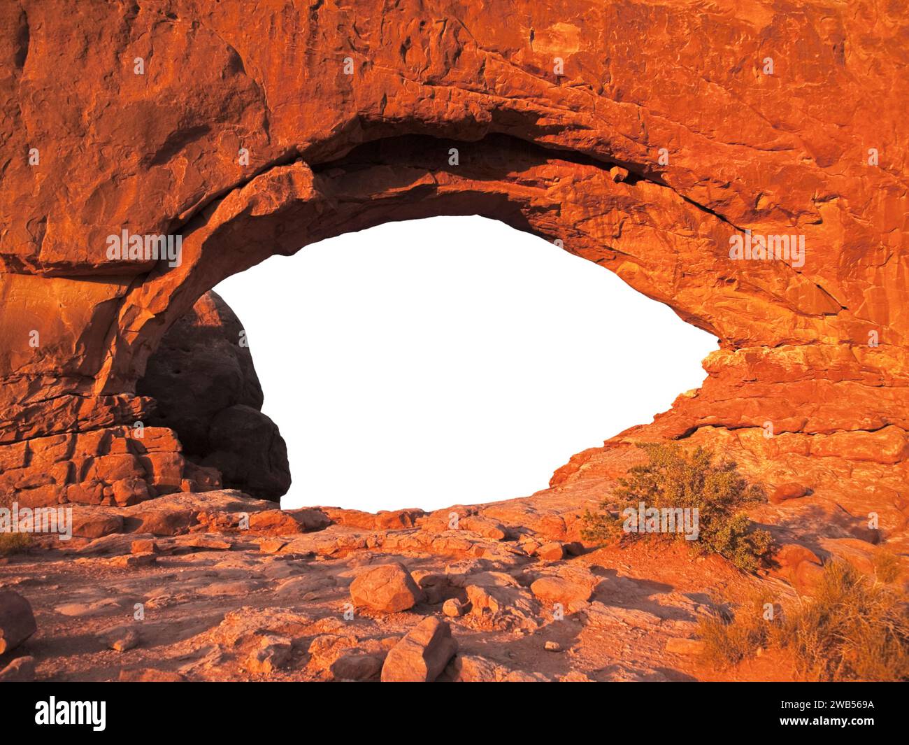 Warm sunset light on North Window Arch at Arches National Park ...