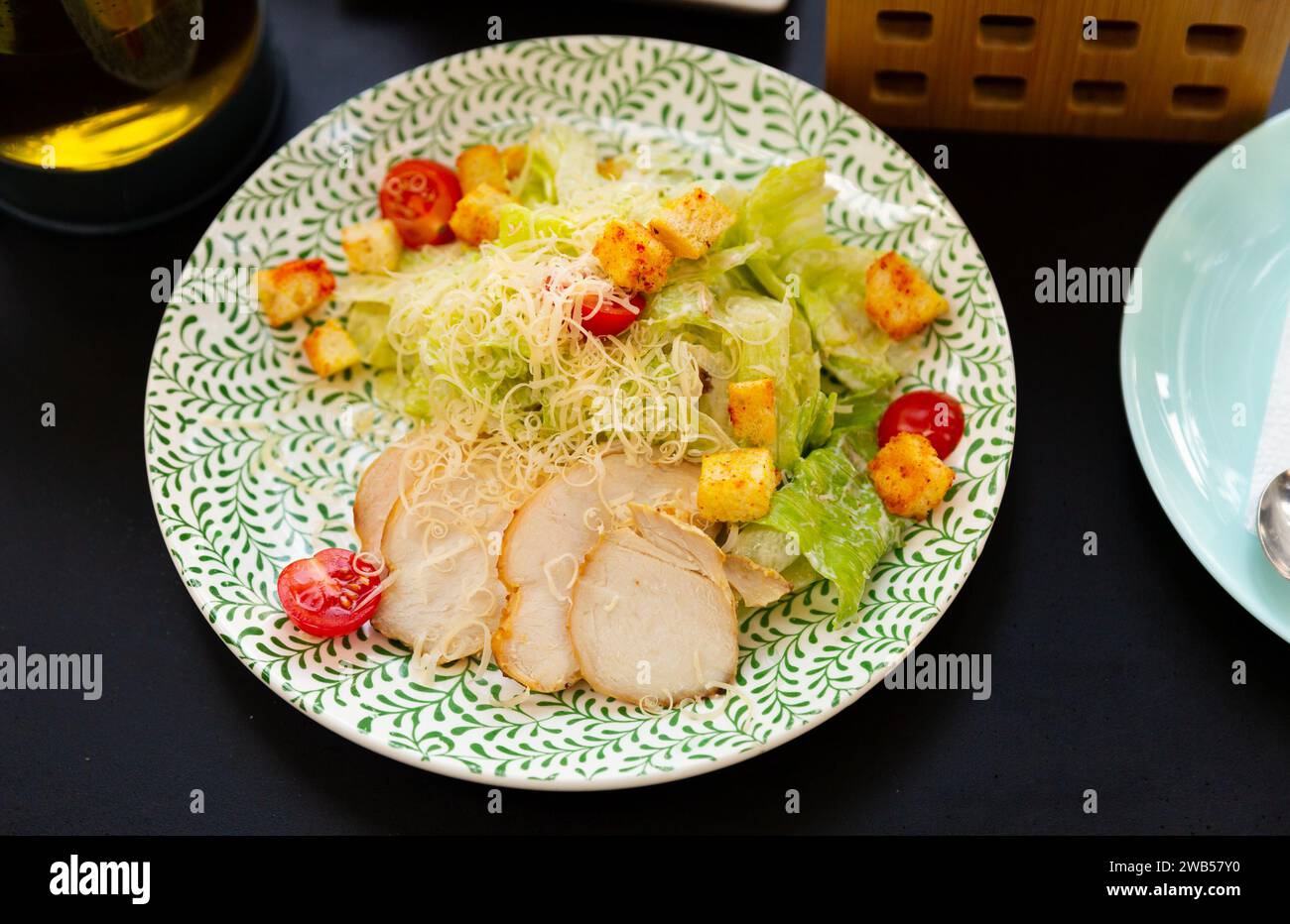 Cesar salad with chicken, lettuce and cheese parmesan Stock Photo - Alamy