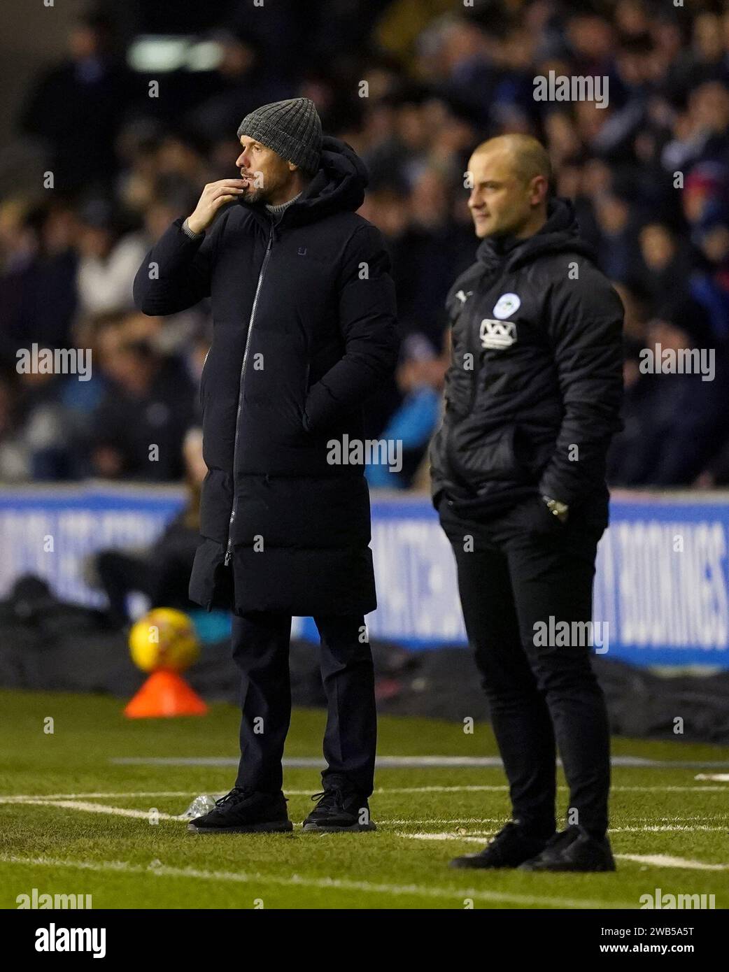 Manchester United manager Erik ten Hag (left) and Wigan Athletic ...