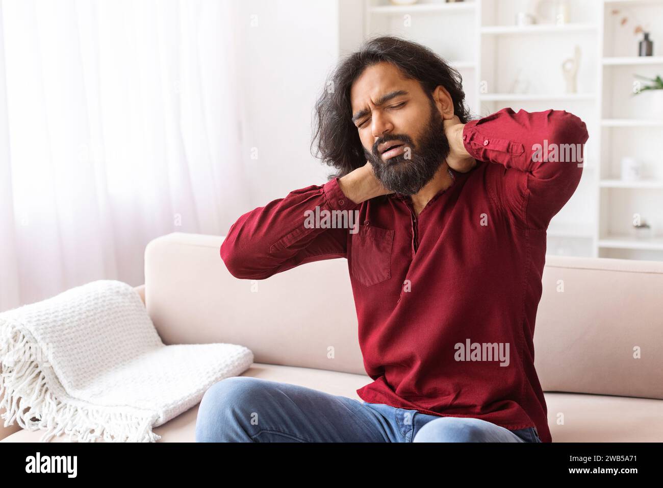 Indian Man Suffering From Neck Pain Massaging Aching Muscles Stock ...