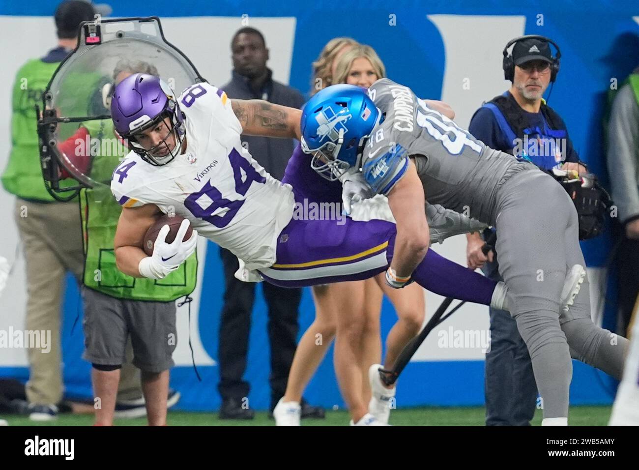Minnesota Vikings tight end Josh Oliver (84) is tackled by Detroit ...