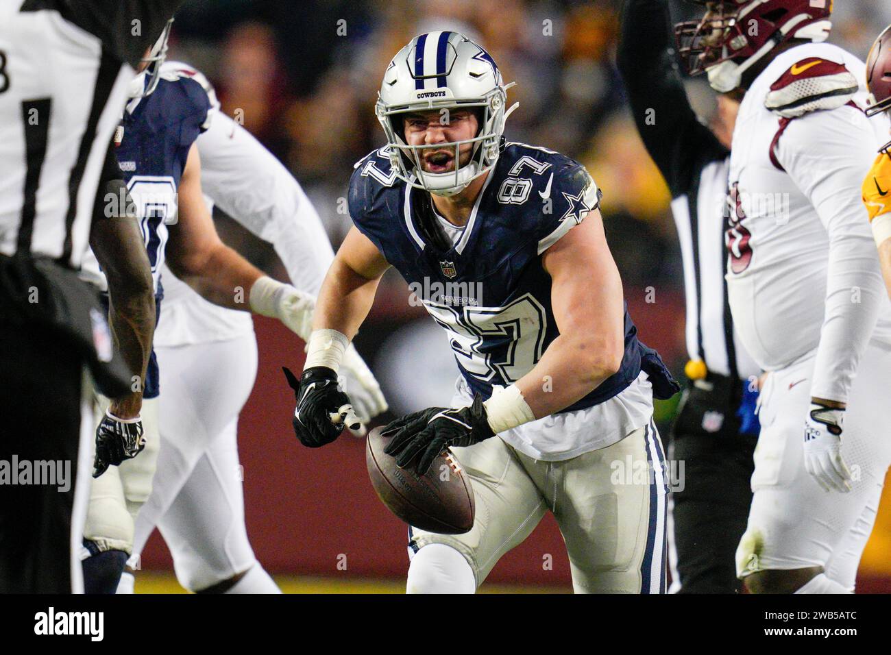 Dallas Cowboys tight end Jake Ferguson celebrates after running for a ...