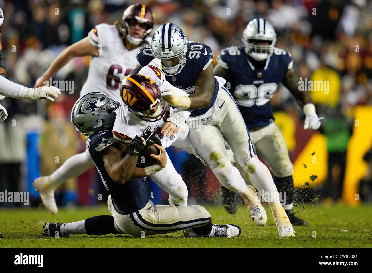 Dallas Cowboys linebacker Micah Parsons (11) and defensive end DeMarcus ...