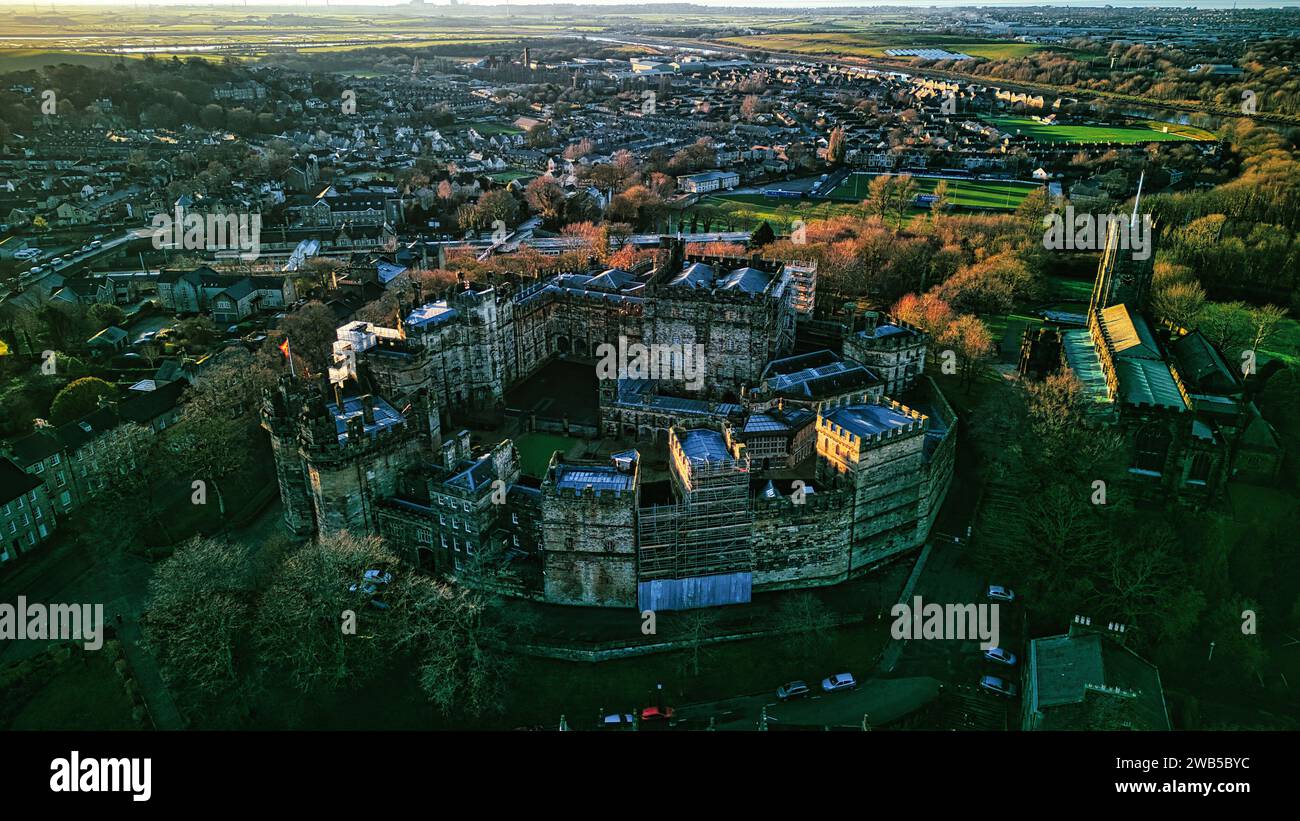 Aerial view of a historic Lancaster castle at sunset with surrounding ...