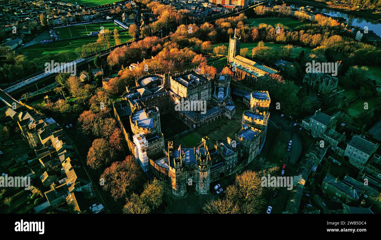 Aerial view of a historic Lancaster castle at sunset with surrounding ...