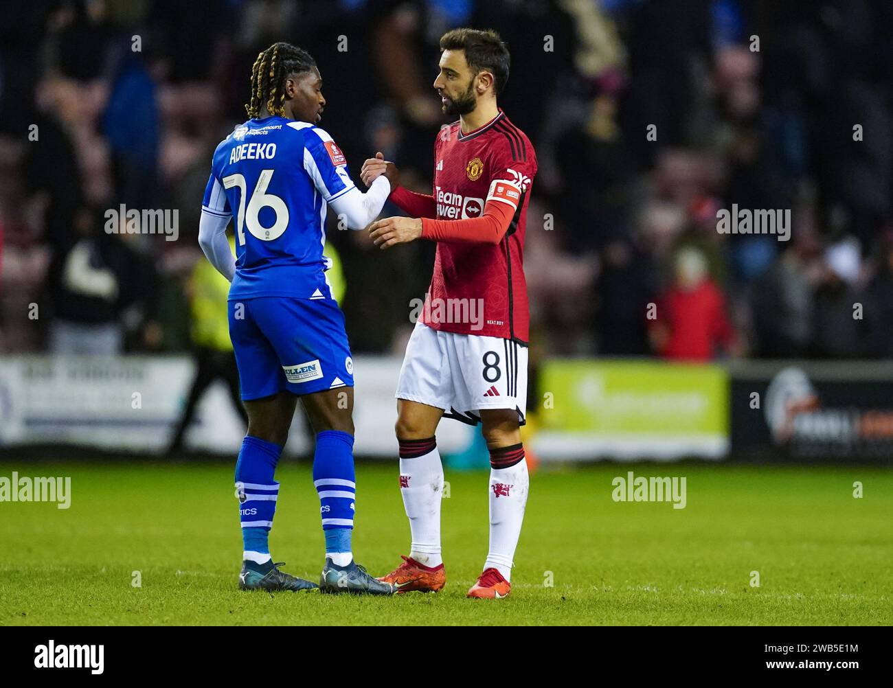 Wigan Athletic's Babajide Adeeko and Manchester United's Bruno ...