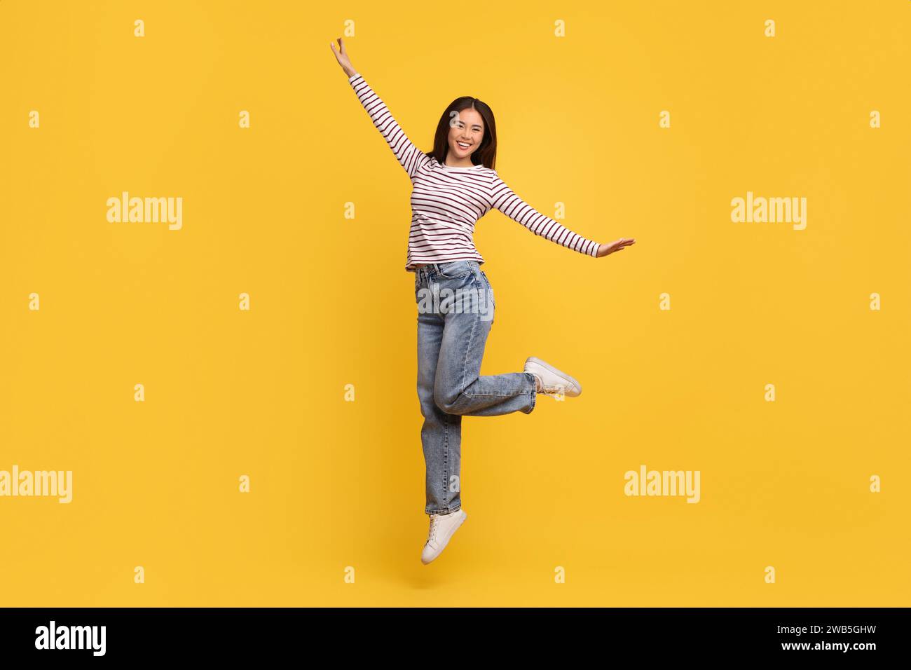 Asian woman dancing attractive smile hi-res stock photography and ...