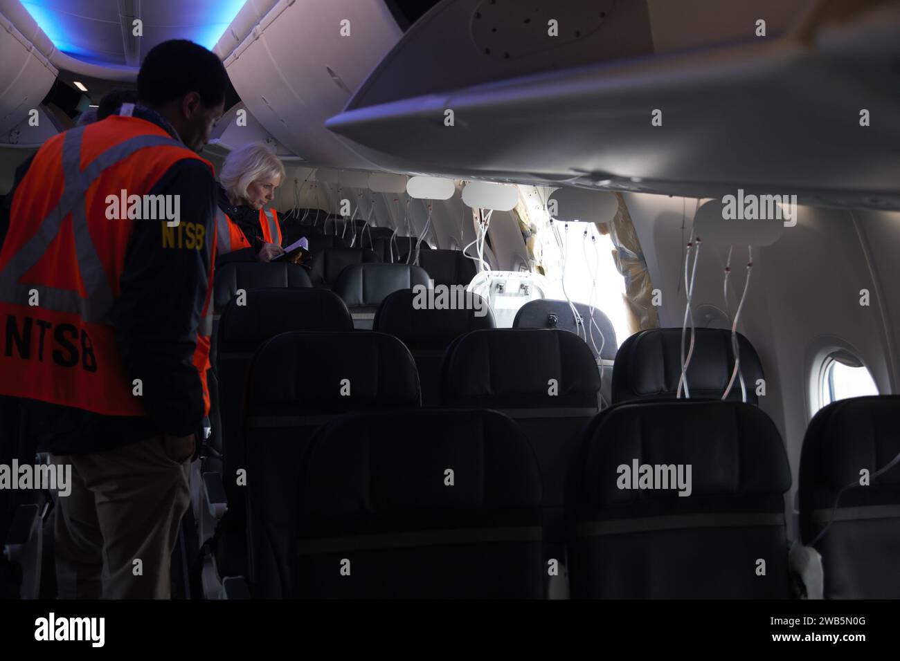 Portland, United States. 08th Jan, 2024. NTSB investigators examine the ...