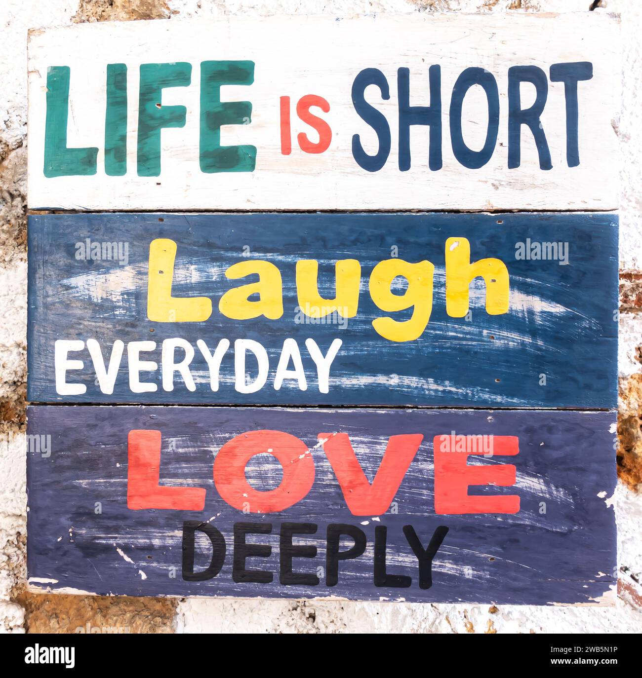 Life is short - laugh every day love deeply wooden plate Stock Photo ...