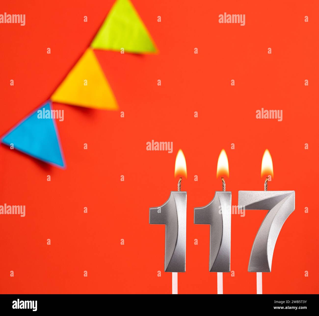 Birthday candle number 117 - Invitation card in orange background Stock ...