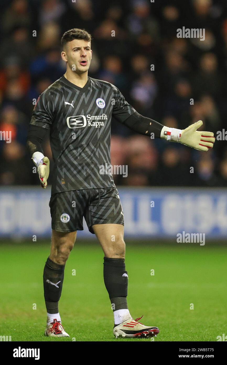 Wigan, UK. 08th Jan, 2024. Wigan Athletic goalkeeper Sam Tickle (1 ...
