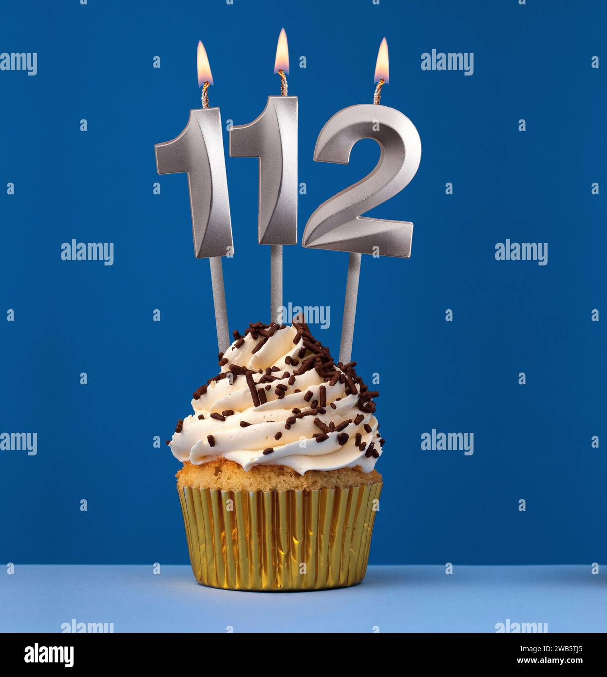 Vertical birthday card with cake - Lit candle number 112 on blue ...