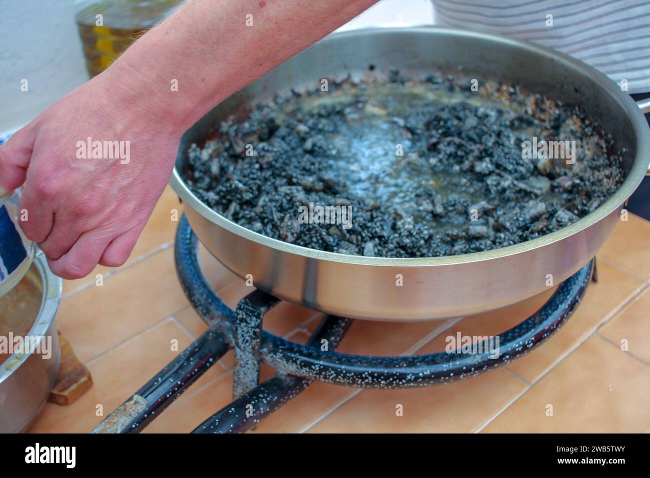 Discover the art of home cooking as a man's hands expertly navigate the ...