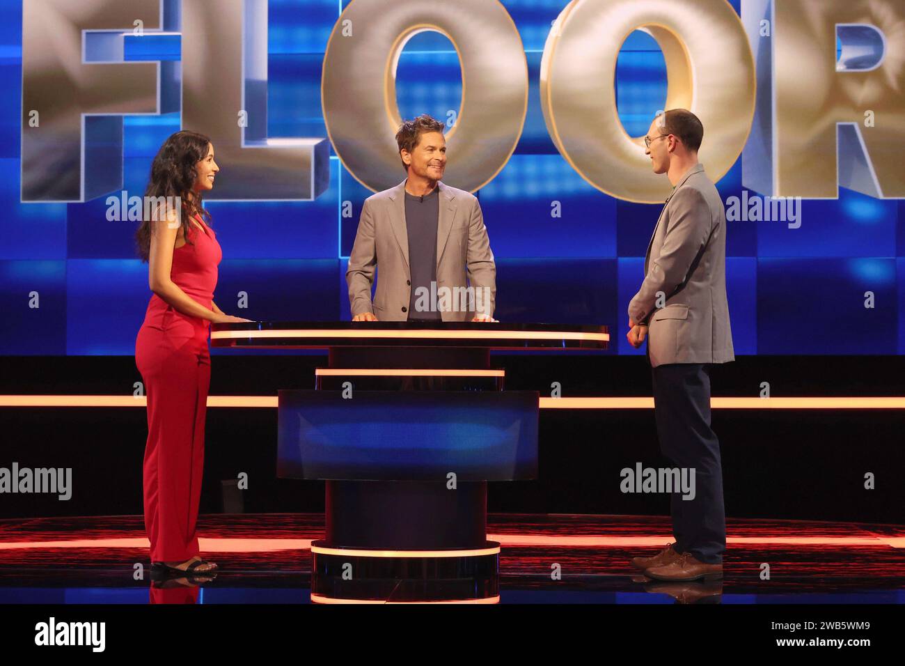 THE FLOOR, from left: contestant Kathleen, host Rob Lowe, contestant ...