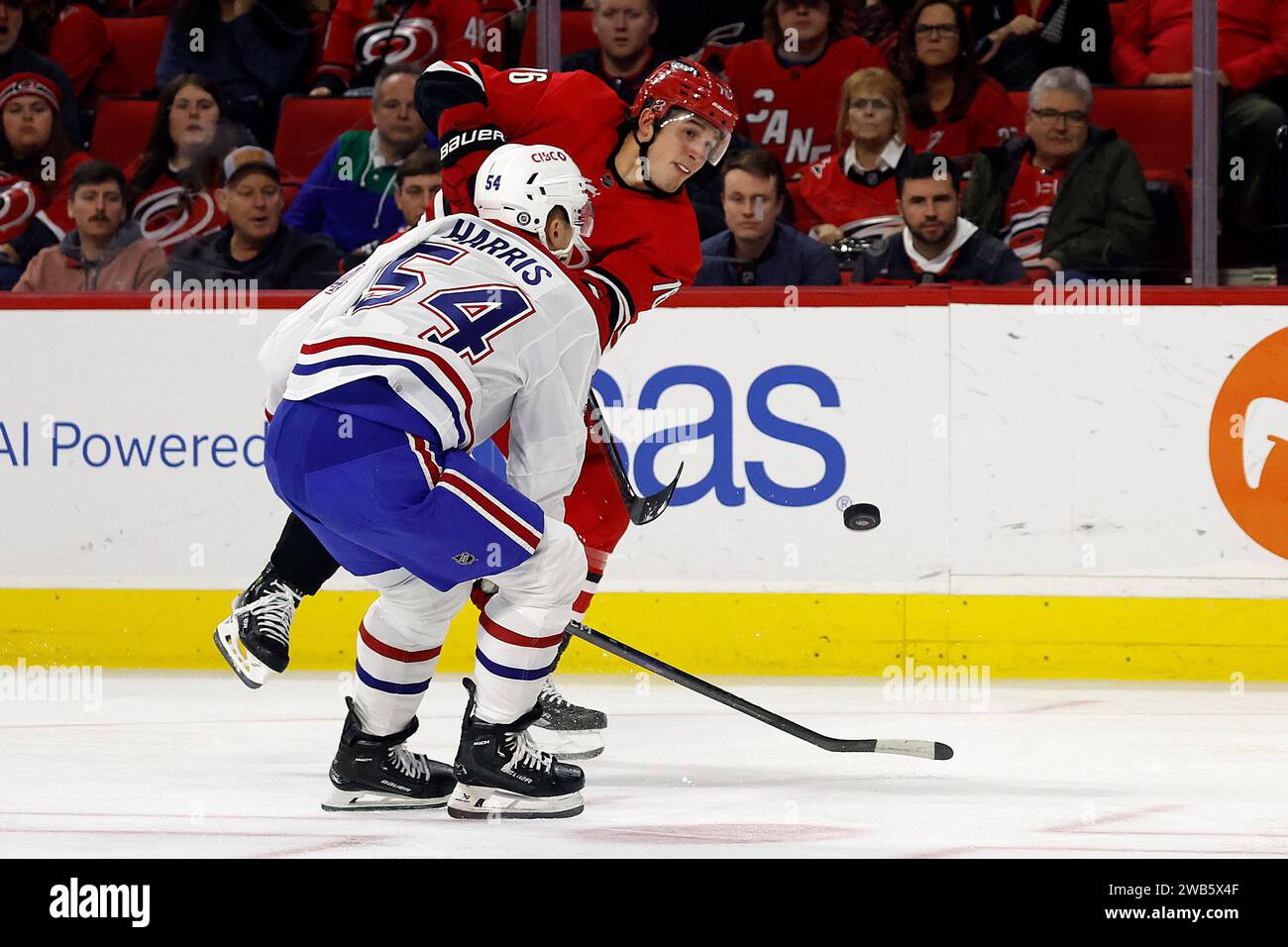 Carolina Hurricanes' Brady Skjei (76) shoots the puck past Montreal Canadiens' Jordan Harris (54 ...
