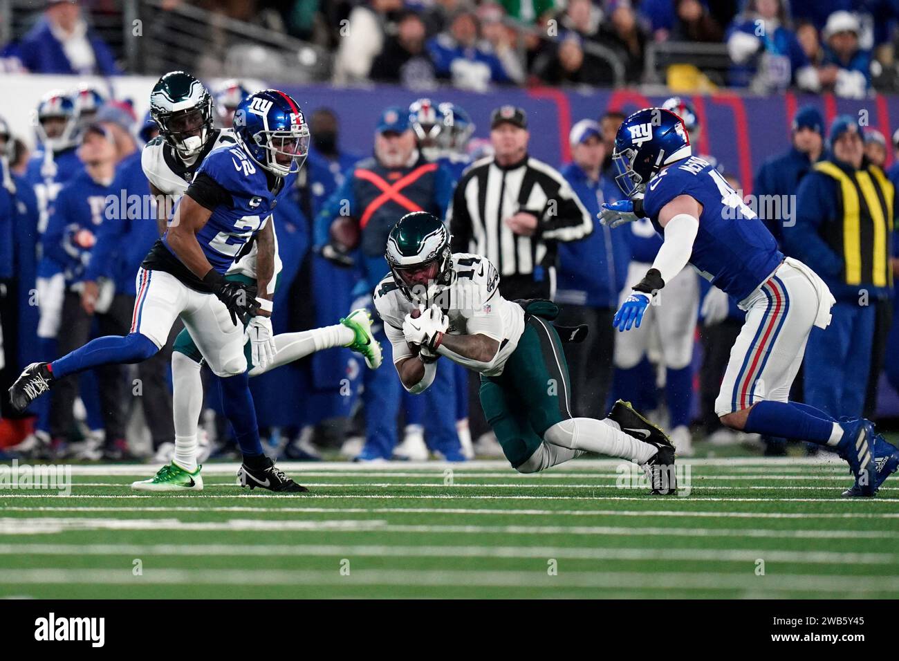 Philadelphia Eagles running back Kenneth Gainwell (14) tries to avoid ...