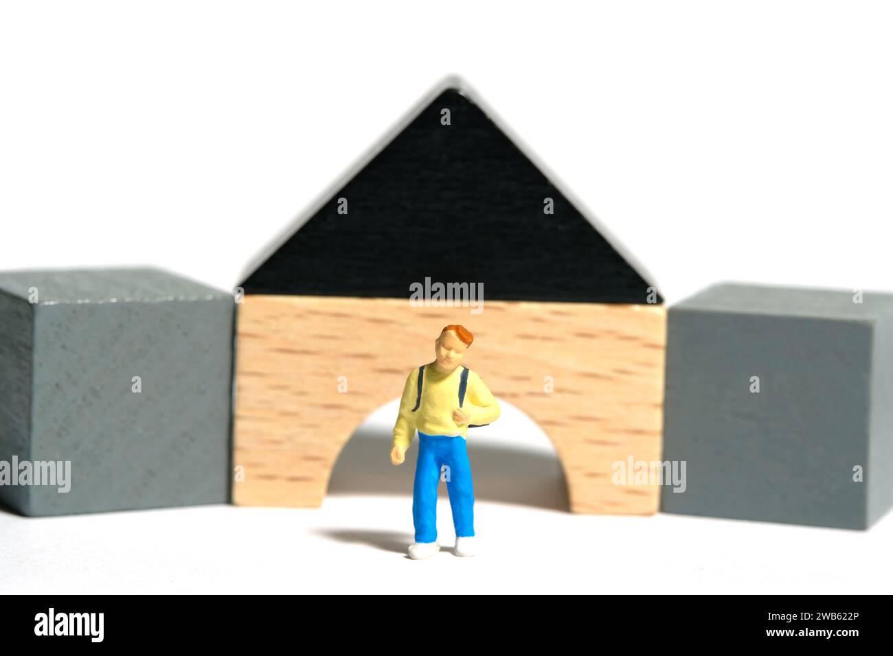 Miniature people toy figure photography. A boy kindergarten student ...