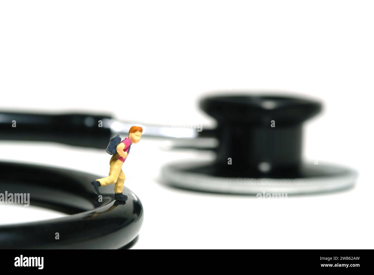 Miniature people toy figure photography. A boy kindergarten student ...