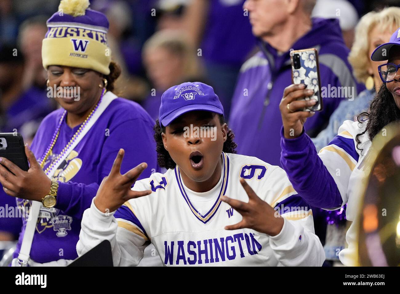 Washington fans watches during warm ups before the national ...