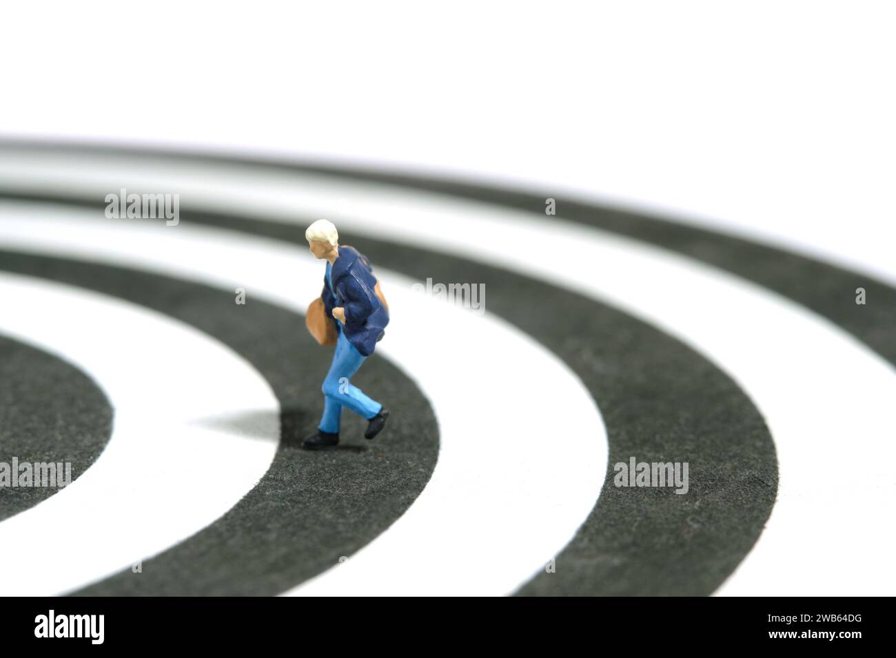 Miniature tiny people toy figure photography. A women college student ...