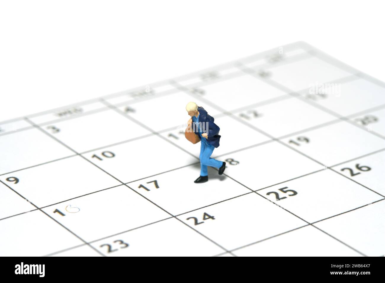 Miniature tiny people toy figure photography. A women student running ...