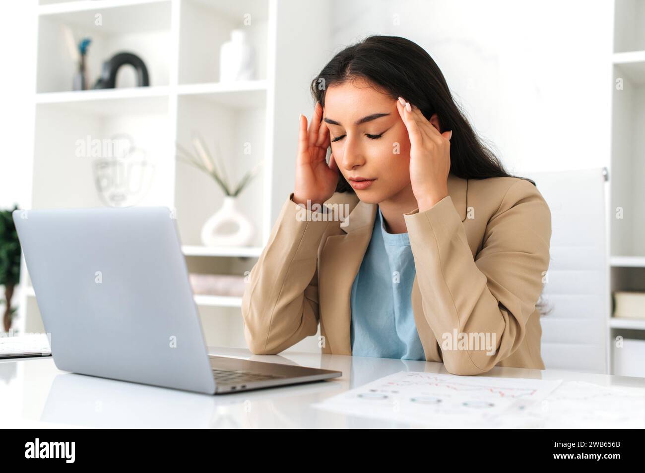Worried woman investor laptop hi-res stock photography and images - Alamy