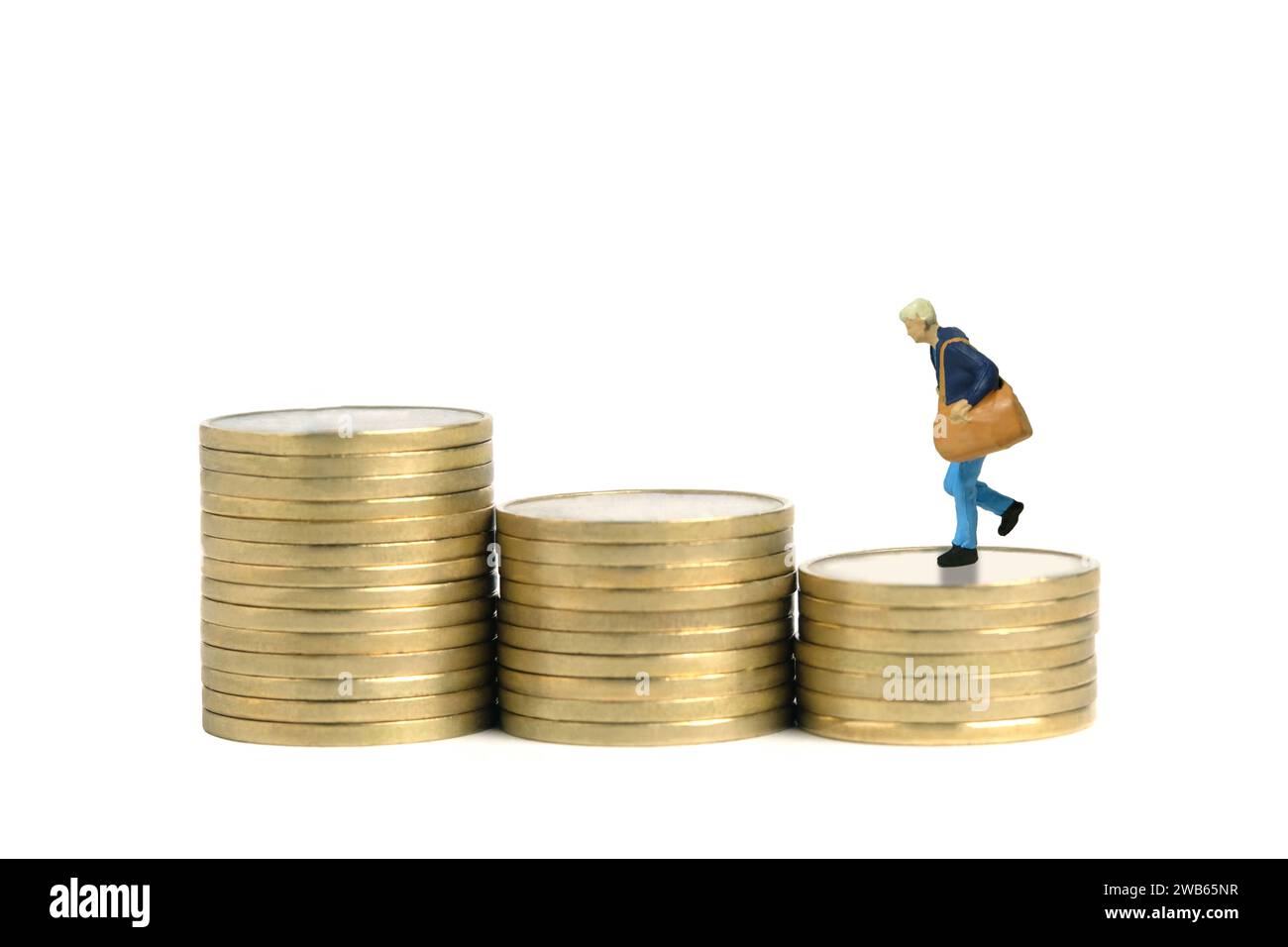 Miniature tiny people toy figure photography. A student running above ...