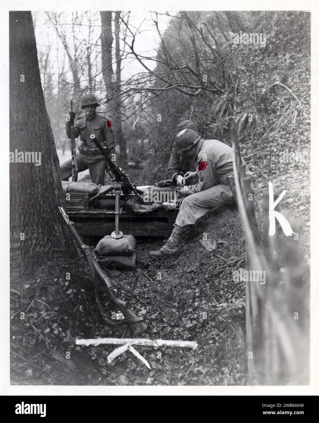 111-SC-360934 - A .50 caliber machine gun and crew are set to repel ...