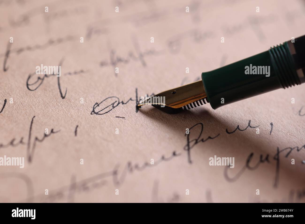 Writing letter with elegant fountain pen, closeup Stock Photo - Alamy