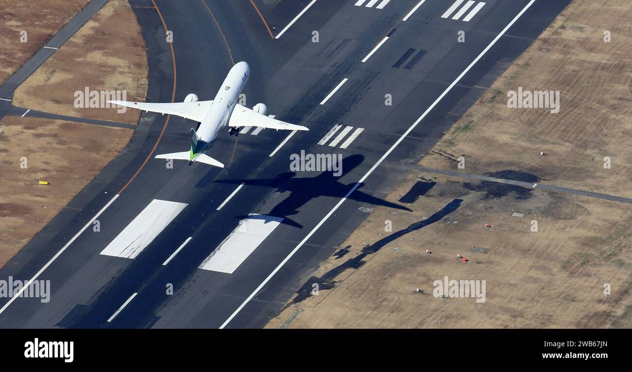 Photo taken from a Kyodo News helicopter shows Runway C at Haneda ...