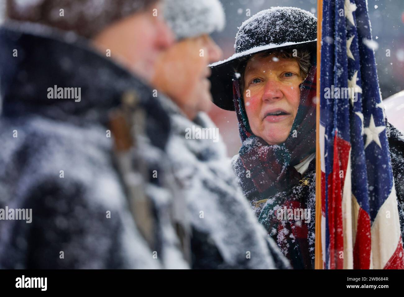 A member of the New England Patriots end zone militia stands guard in ...